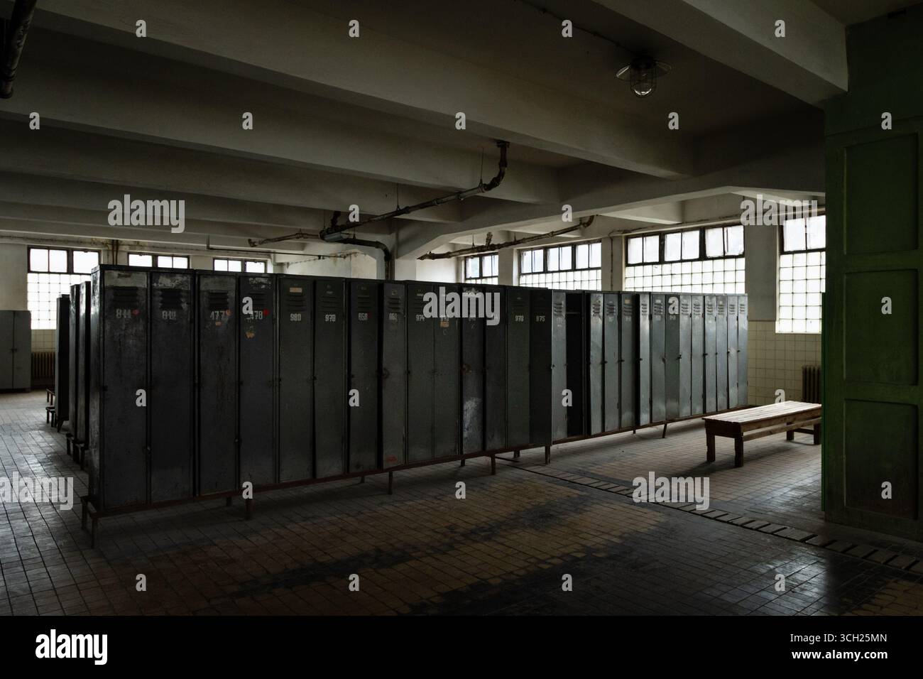 Historic miners’ lockers and benches inside the preserved dressing room ...