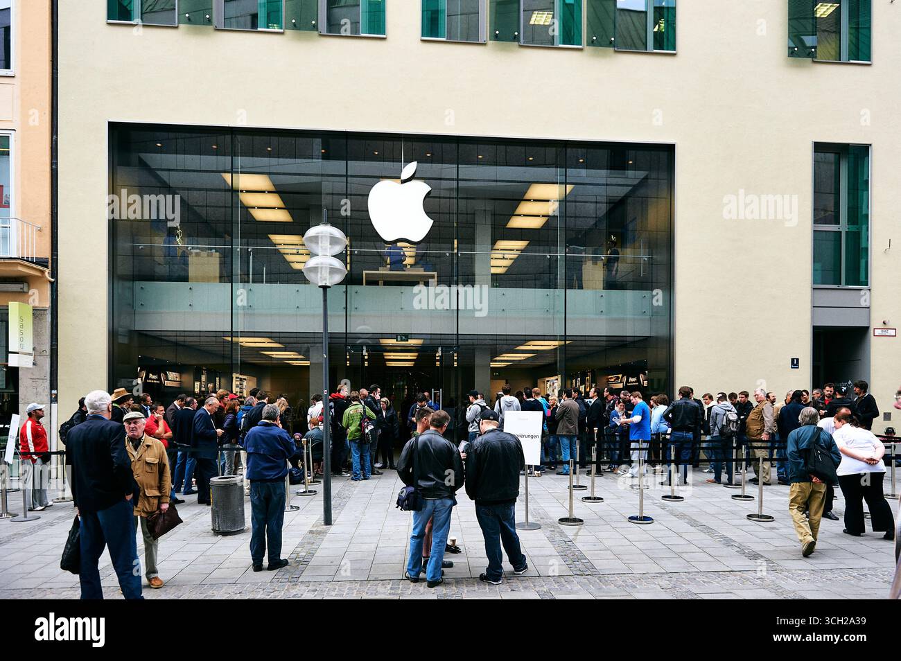Crowd gathering for new Apple product launch in front of Apple Store in ...