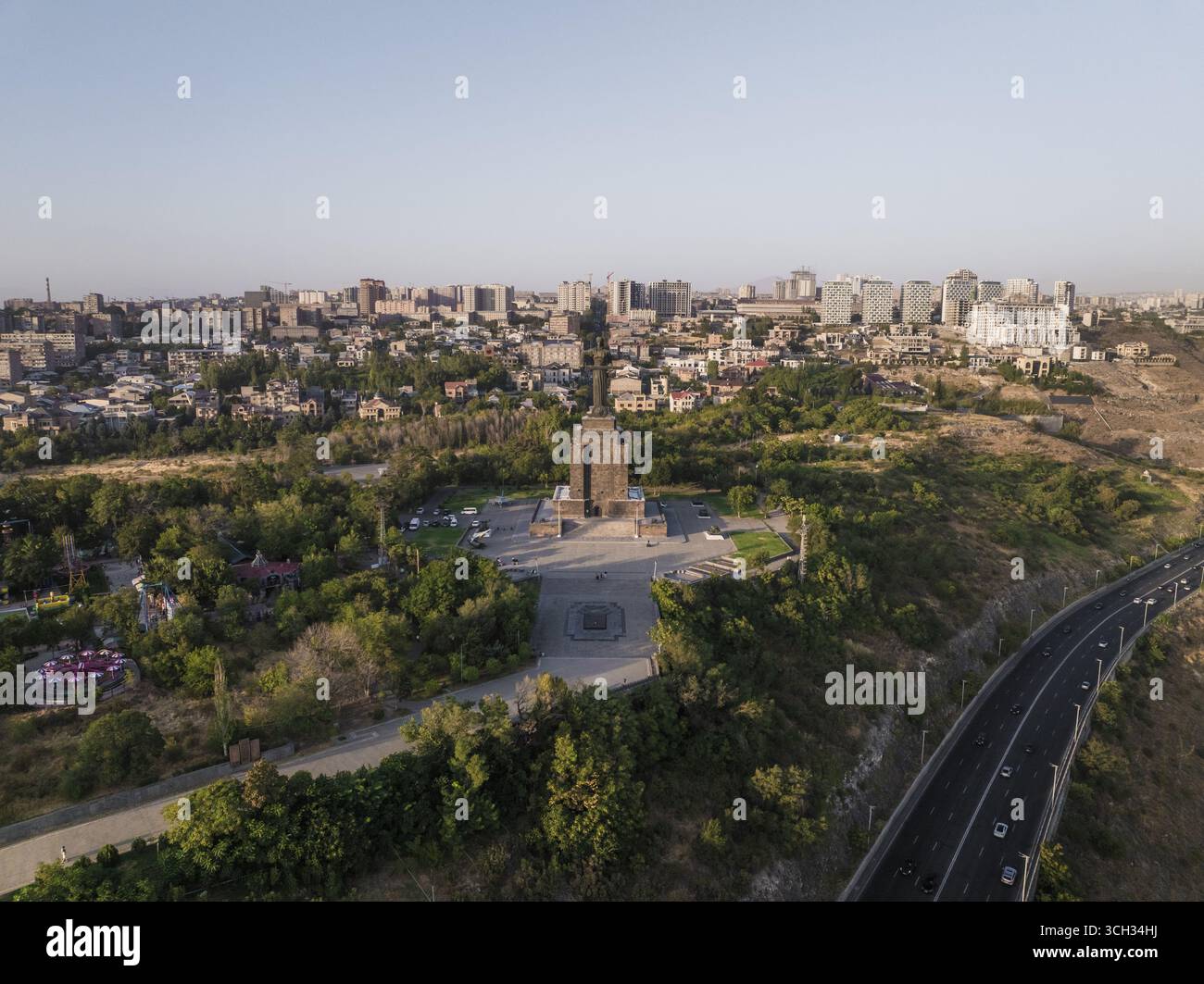 Aerial view of the Mother Armenia statue standing tall amidst lush ...