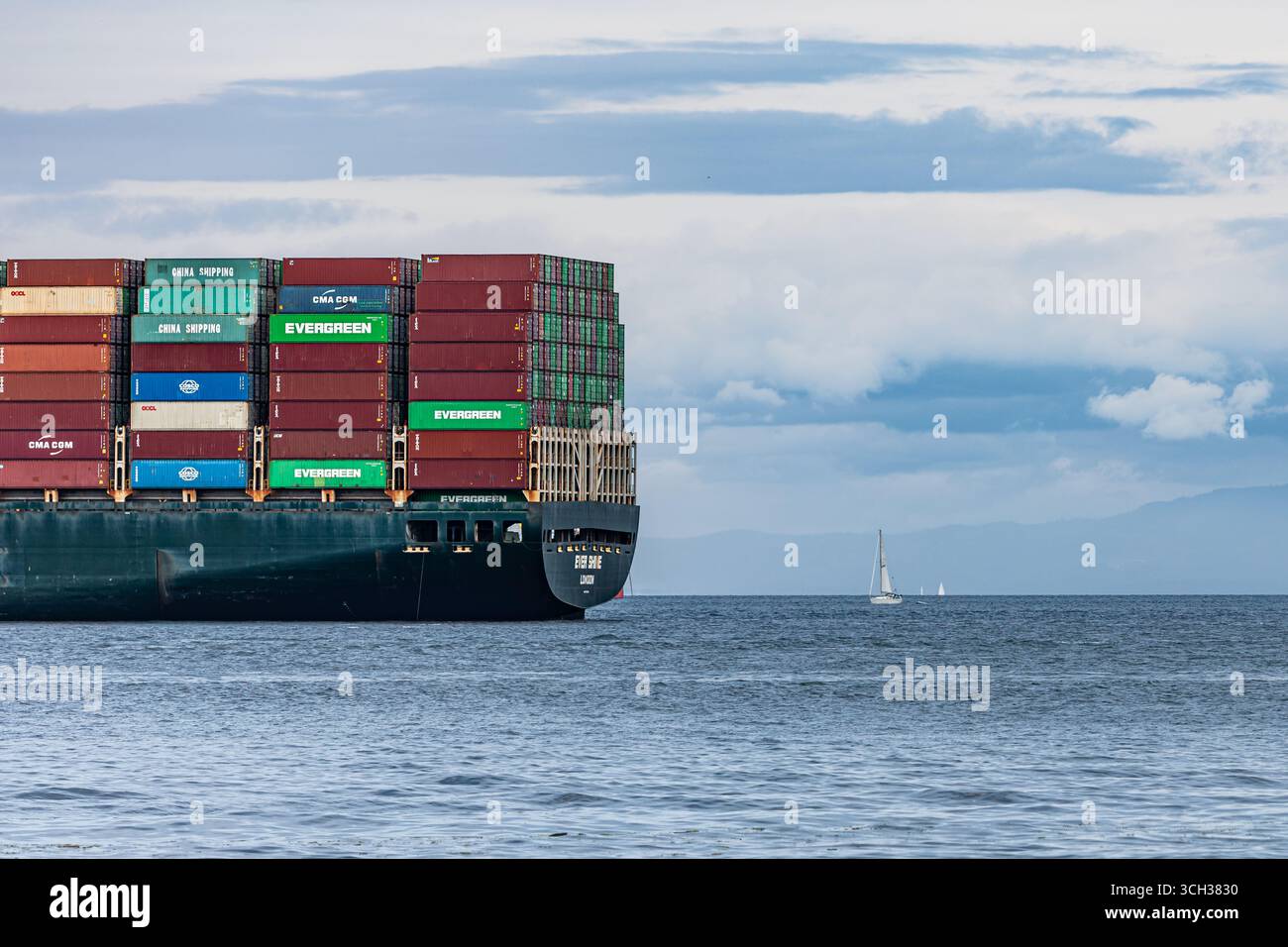 Evergreen container ship full of cargo docked at Vancouver Island ...
