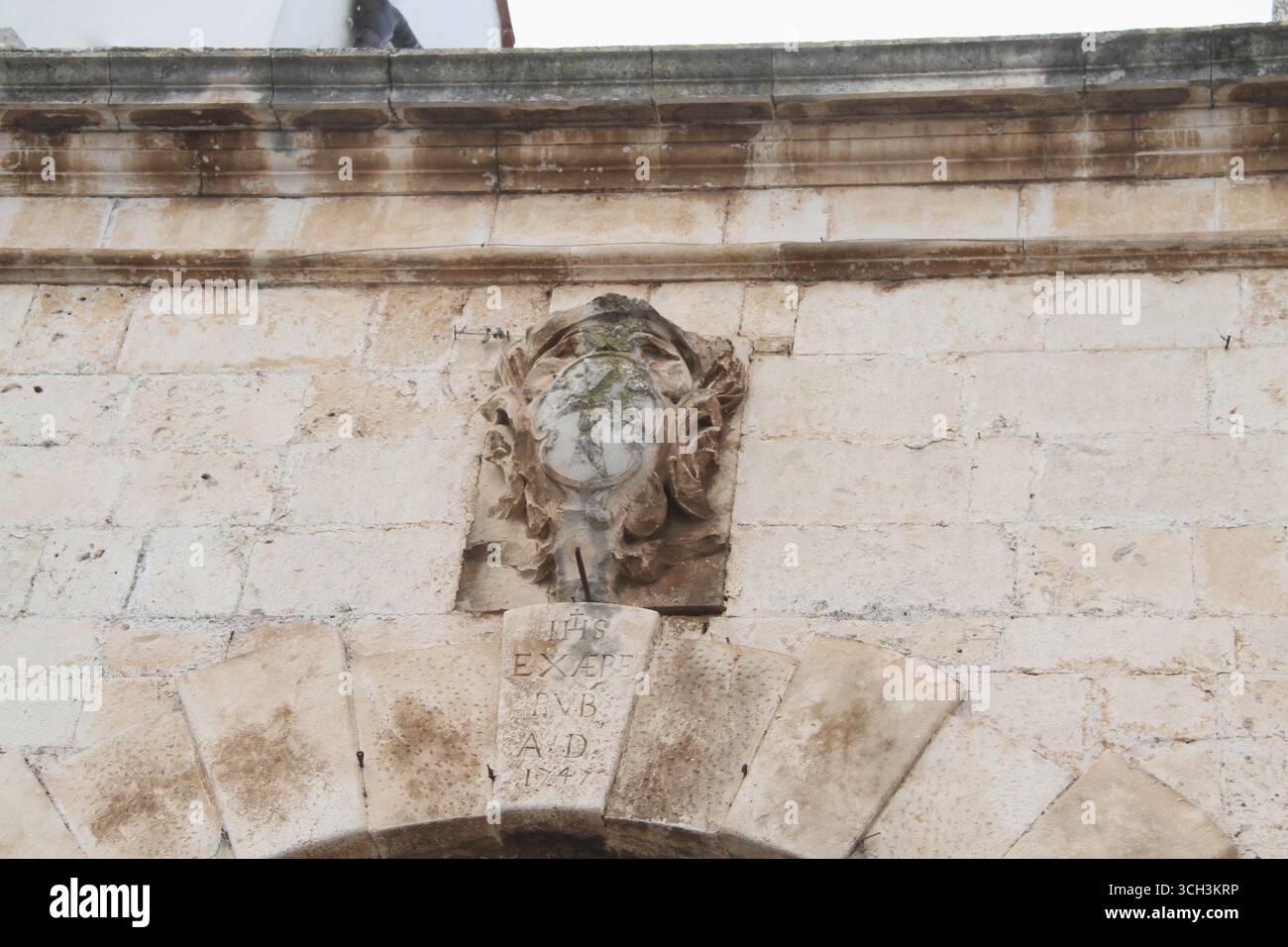 The Maltese Cross on the medieval Porta Barsento, one of the few ...