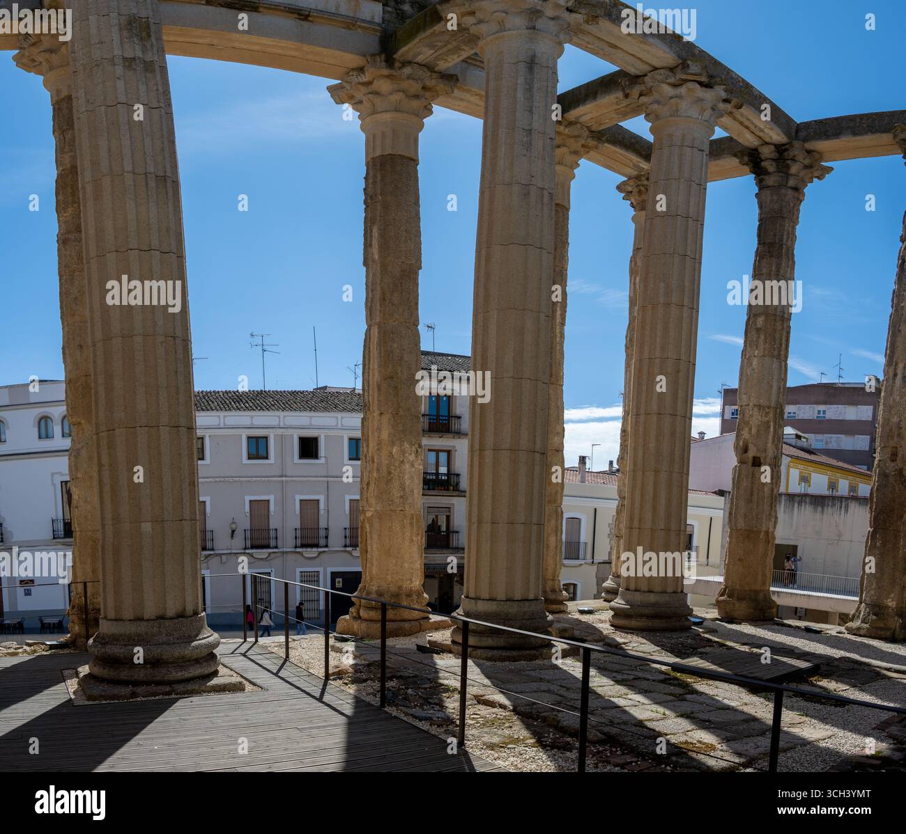 Ancient Roman columns from the Temple of Diana in Merida, Spain under a ...