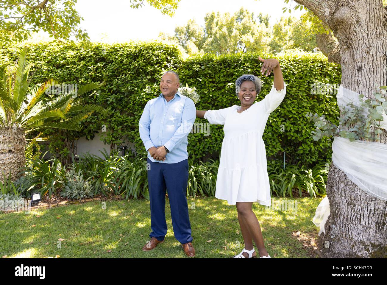 Woman joyfully dancing outdoors hi-res stock photography and images - Alamy