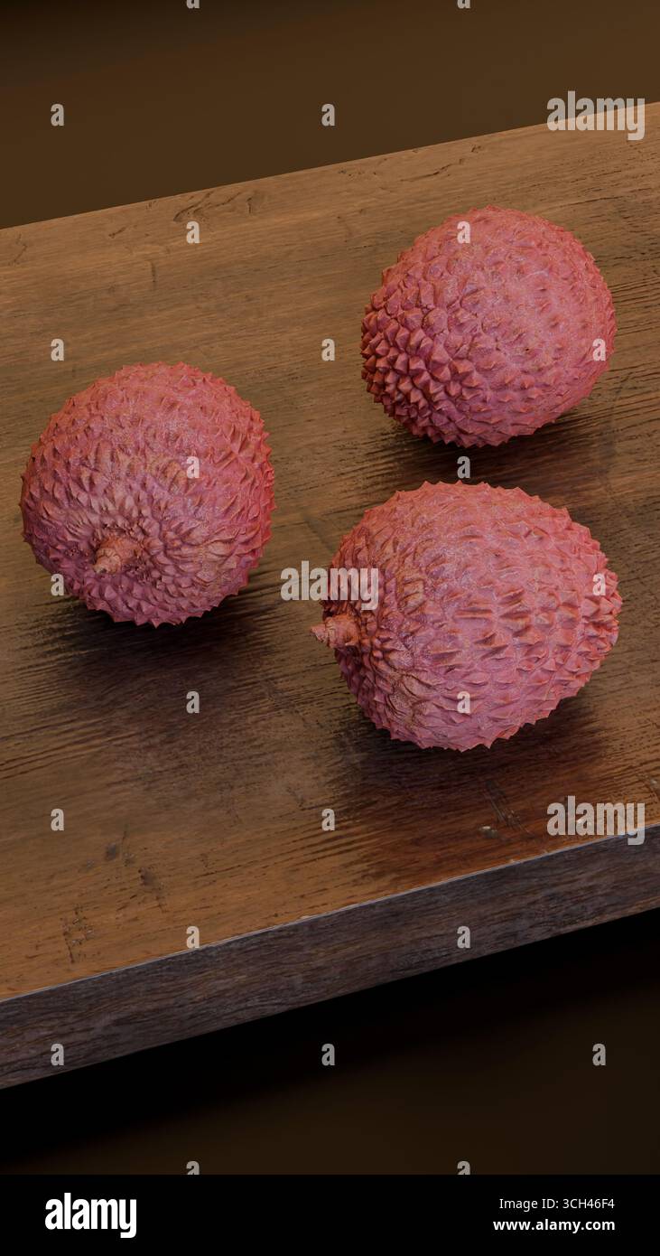 Three lychee fruits are placed on a rustic dark wooden board ...