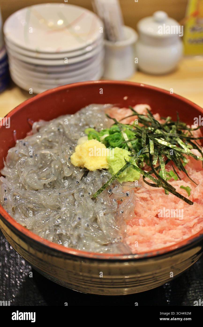 Japanese cuisine: raw whitebait and negitoro (minced raw tuna) rice ...