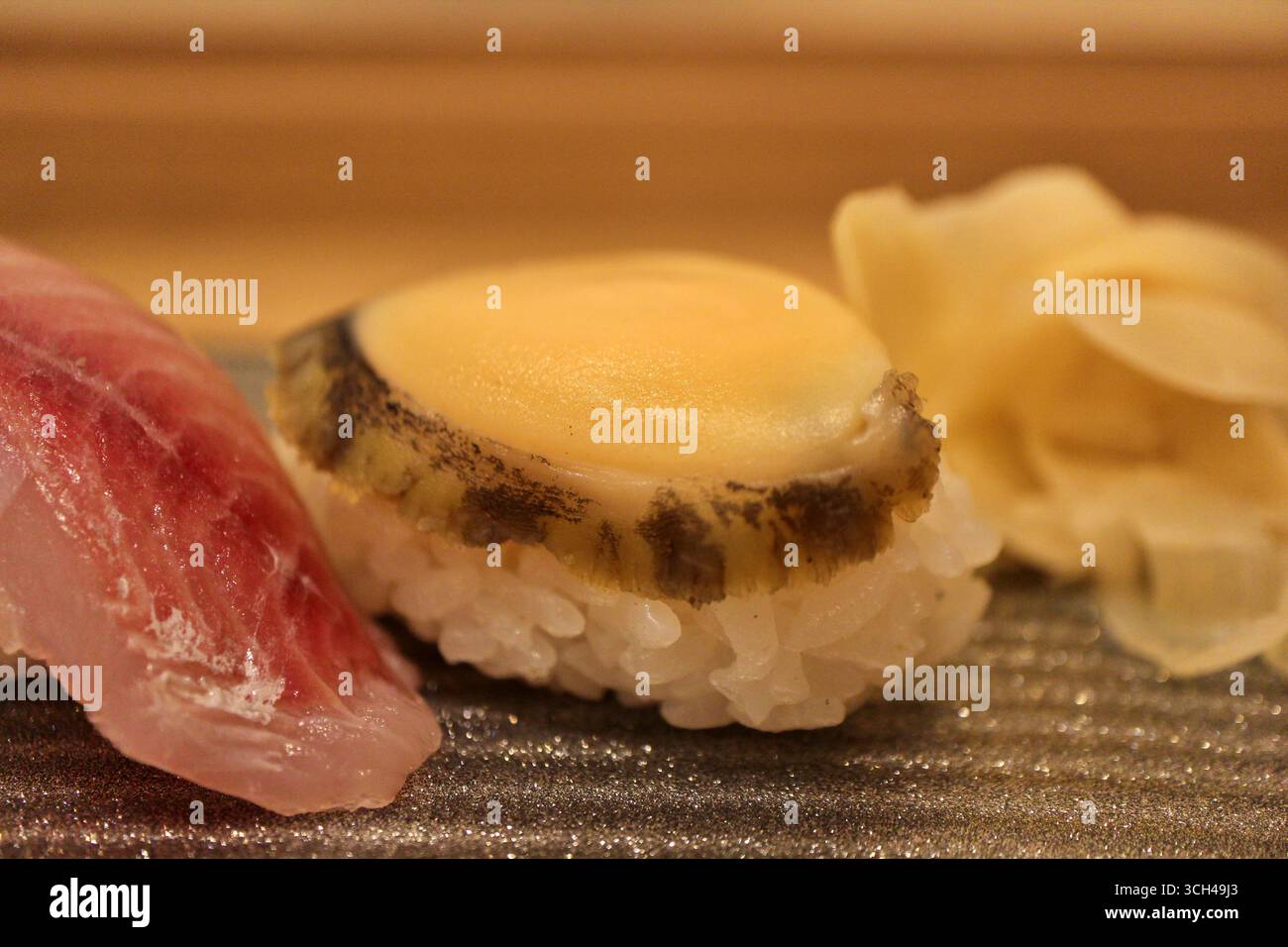 Japanese cuisine: Ezo abalone nigiri-zushi in Mishima, Shizuoka, Japan ...