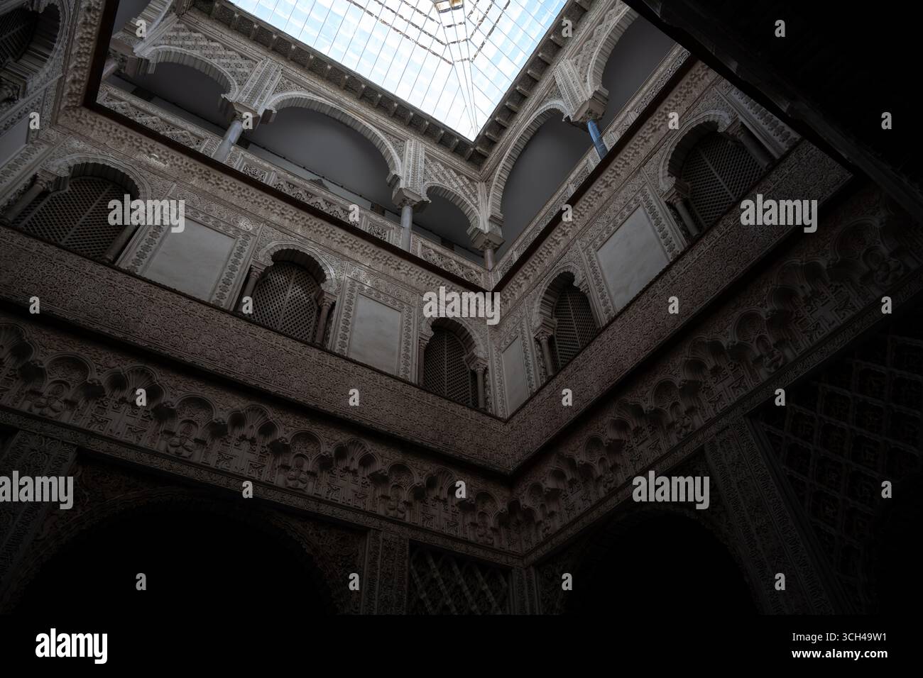 An intricate architectural interior featuring ornate carvings, multiple ...
