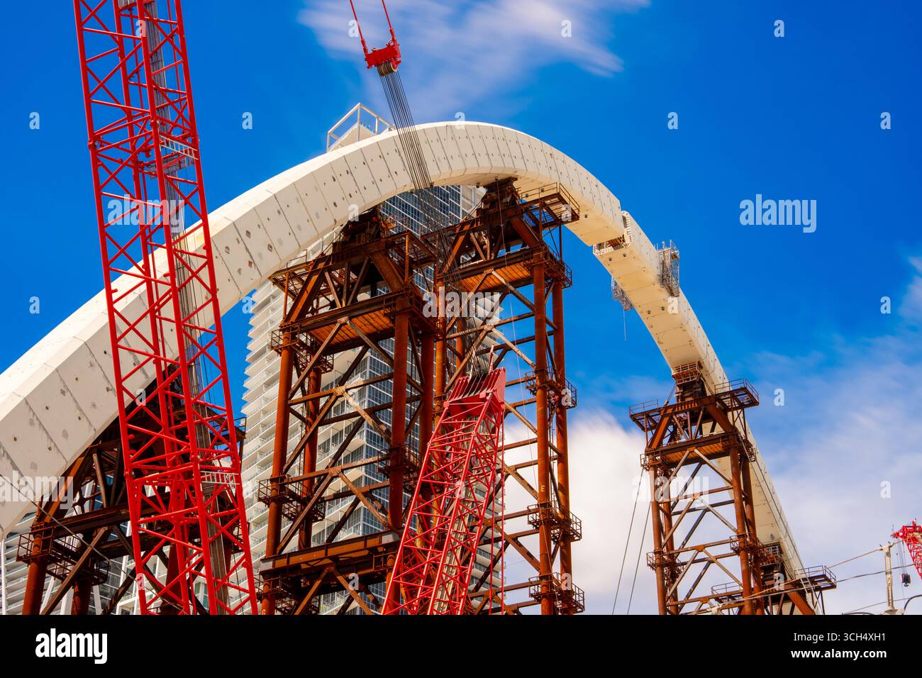 Bridge construction Downtown Miami 2025. iew of arches supported by ...