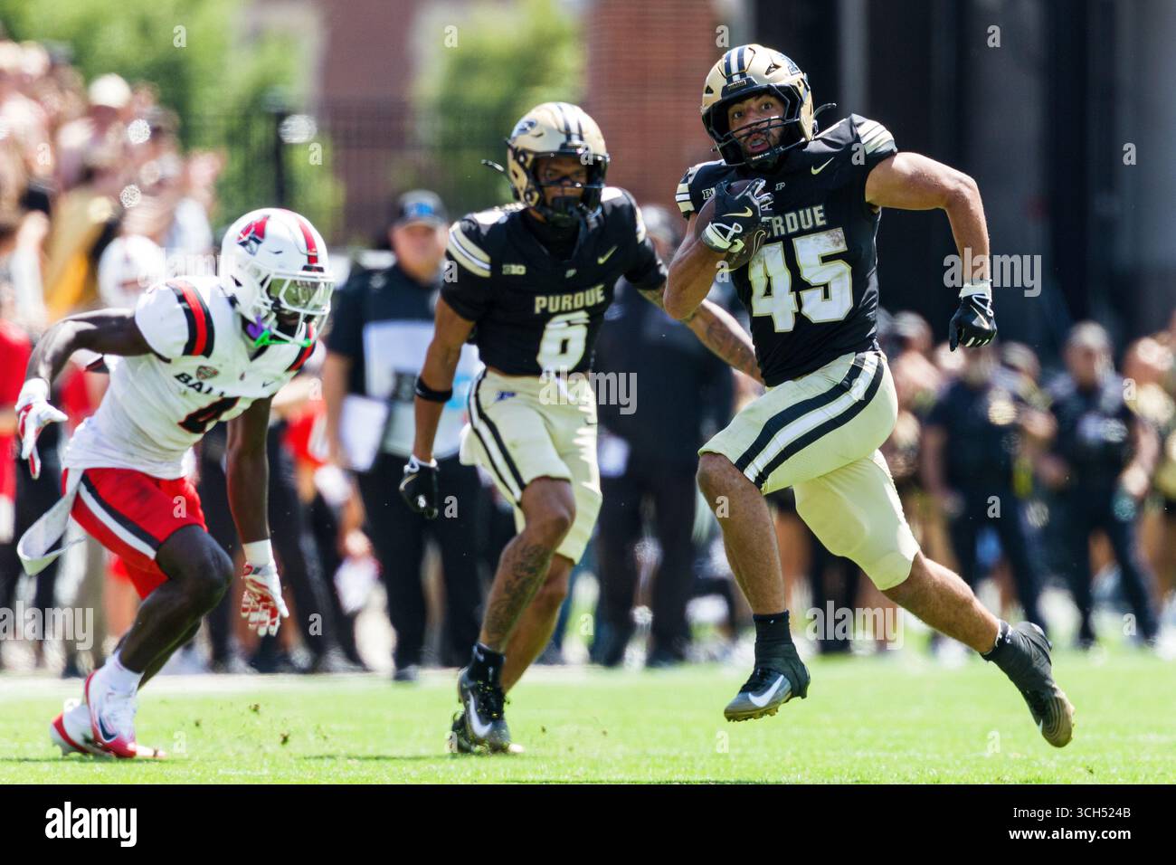 August 30, 2025: Purdue running back Devin Mockobee (45) runs with the ...