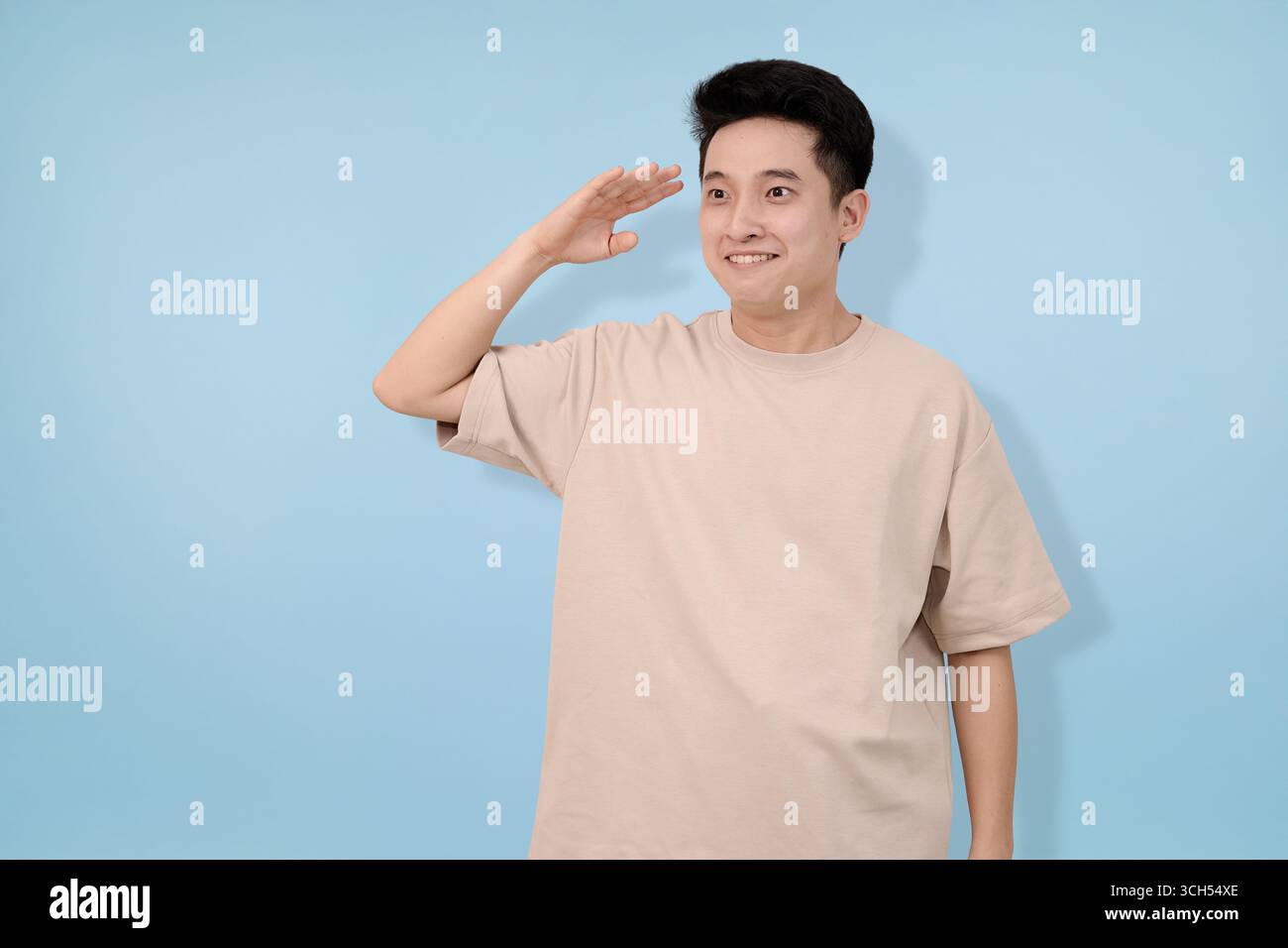 Happy man saluting enthusiastically hi-res stock photography and images ...