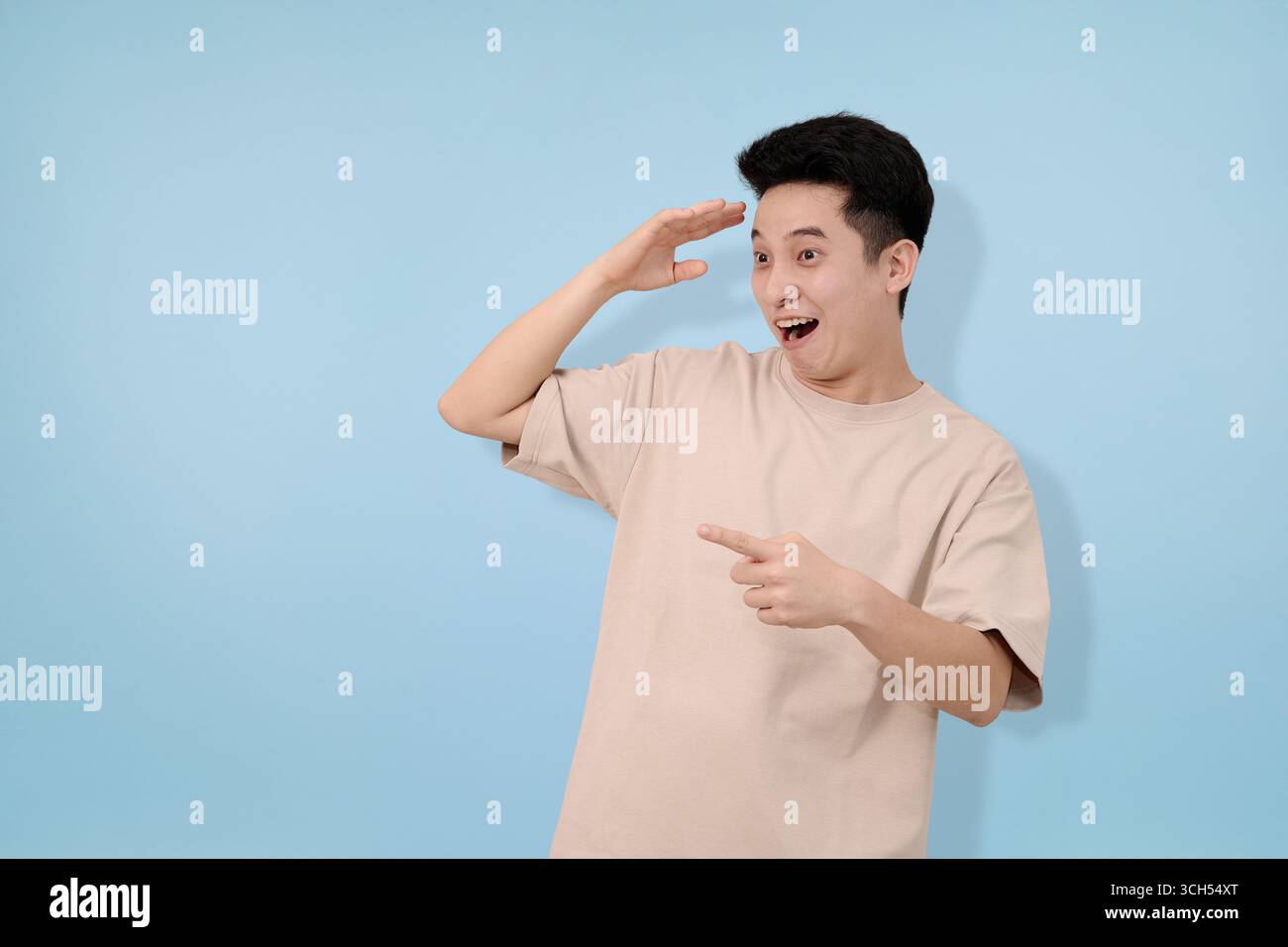 Happy man saluting enthusiastically hi-res stock photography and images ...