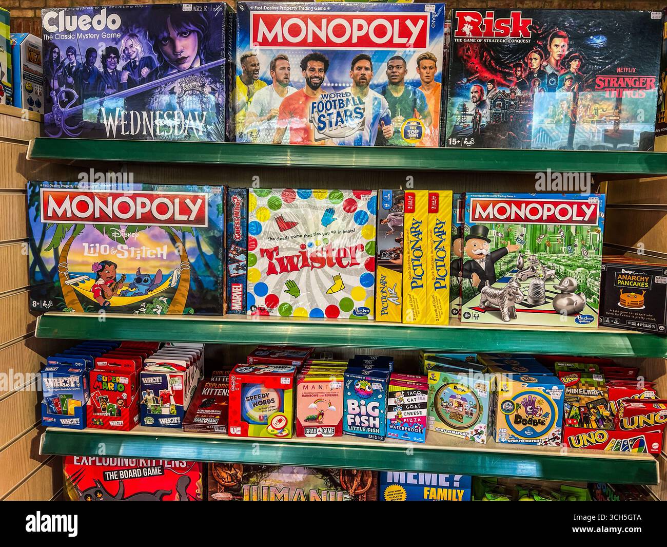 Shop display of traditional popular board games on shelves Stock Photo ...