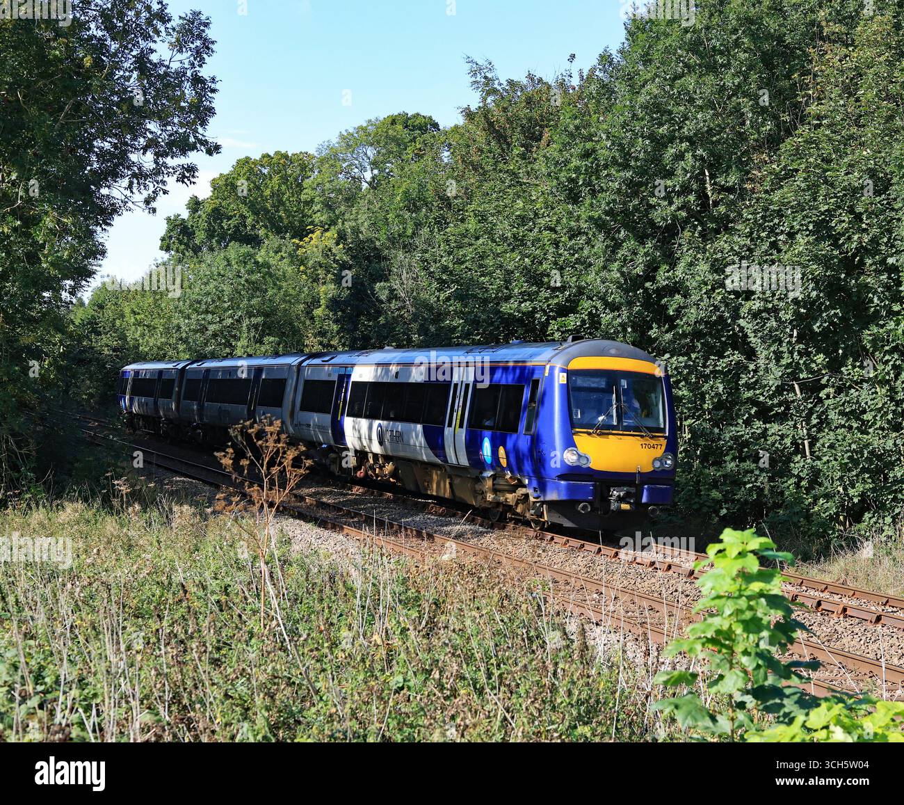 Passenger train running towards camera hi-res stock photography and ...