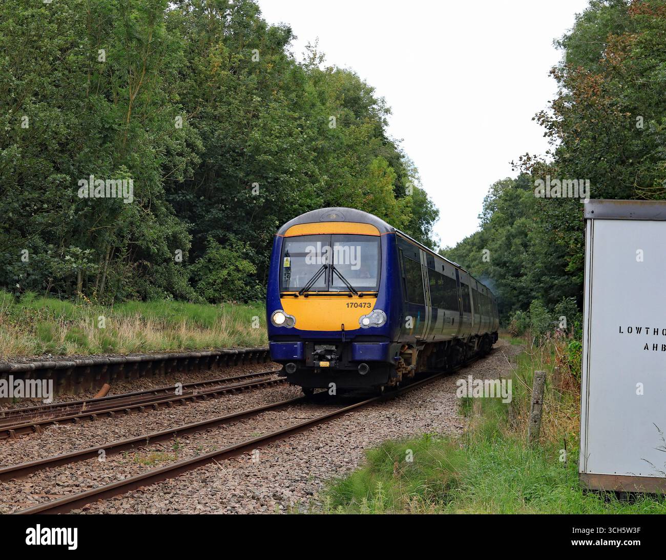 Train passes disused platforms hi-res stock photography and images - Alamy