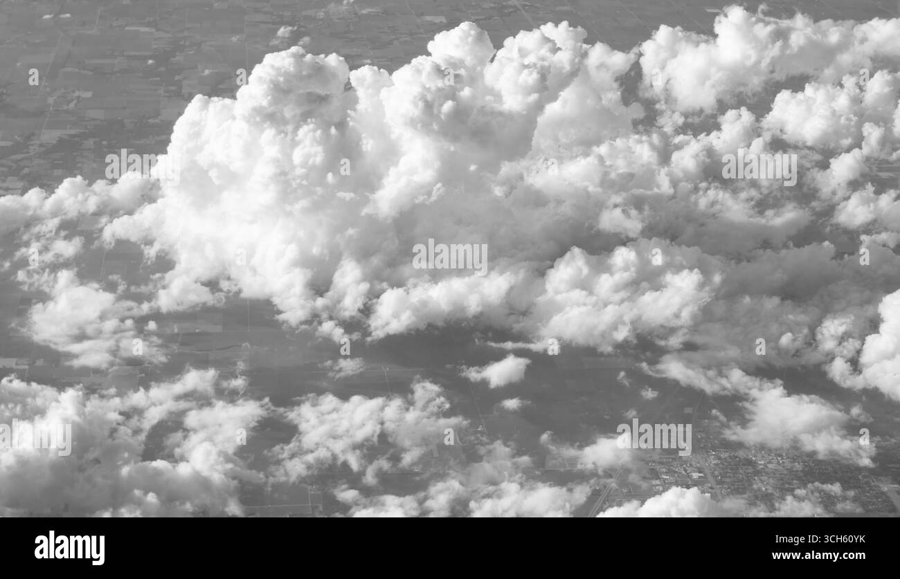 blue sky with a few clouds. The sky is very bright and the clouds are ...
