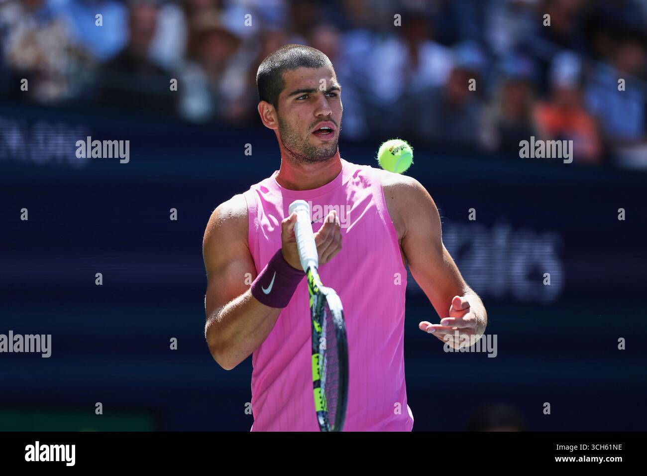 Carlos Alcaraz, of Spain, readies to serve against Arthur Rinderknech, of France, during the ...