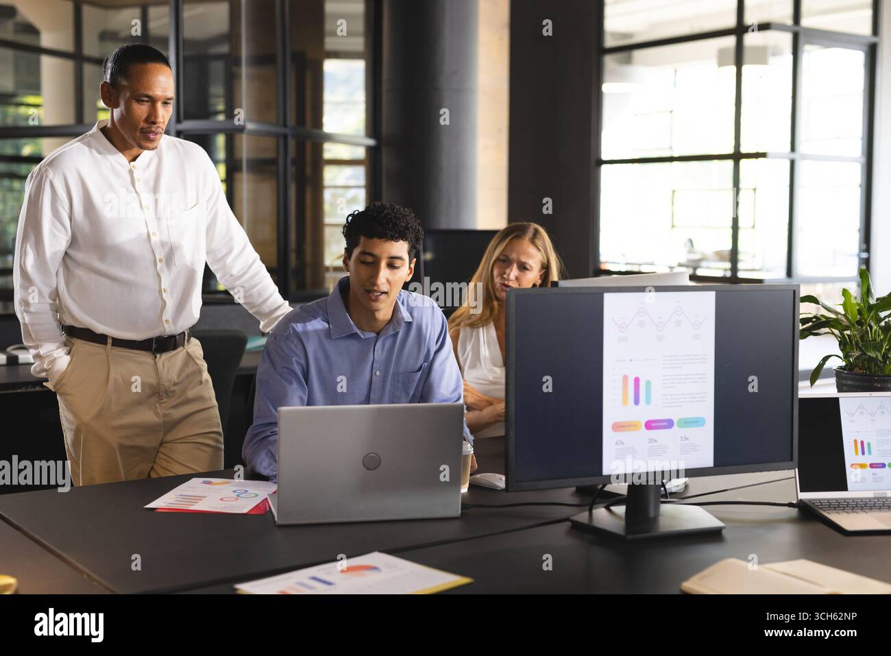 Reviewing data charts on hi-res stock photography and images - Alamy