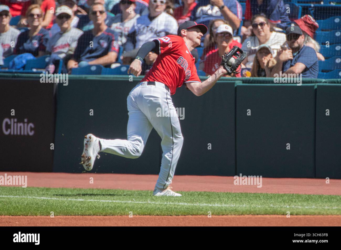 Cleveland Guardians' Kyle Manzardo catches a pop foul hit by Seattle ...