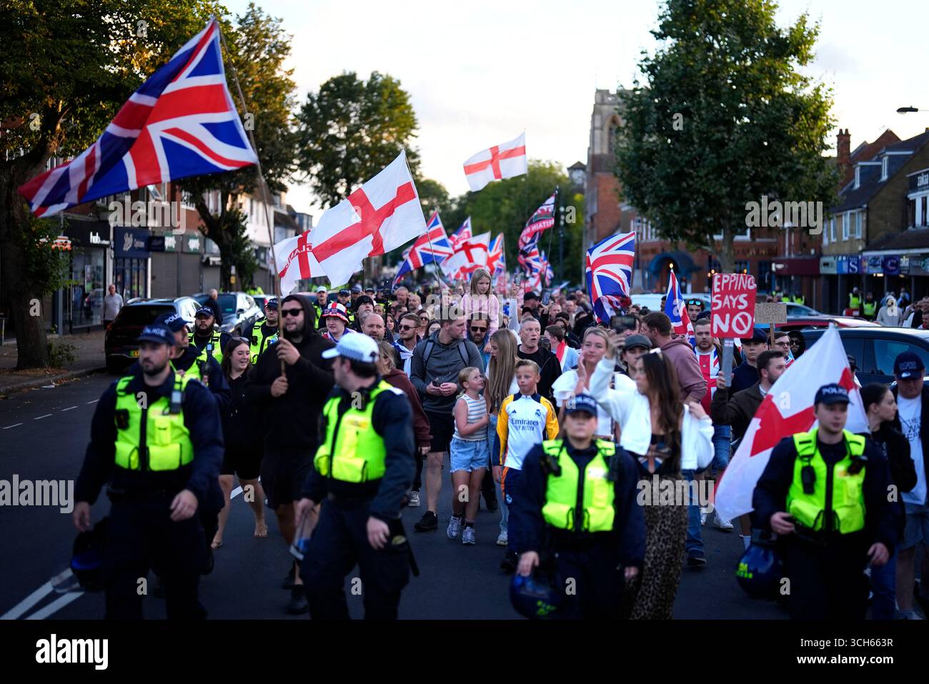Protesters marching in Epping, Essex after a temporary injunction that ...