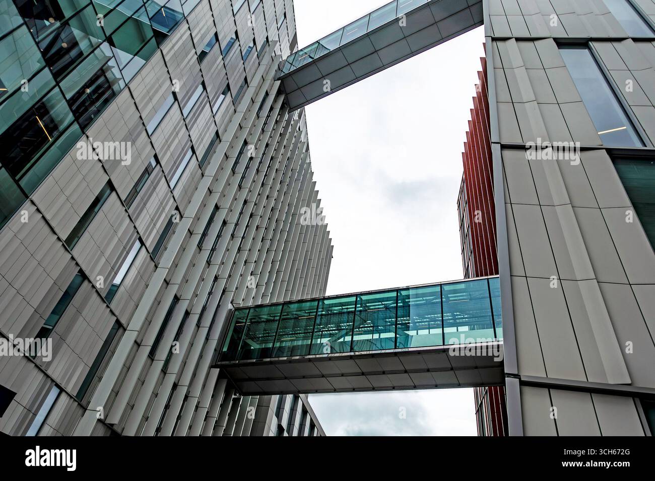 Modern glass skybridges connect striking office blocks at Google’s Bolands Mills development in ...
