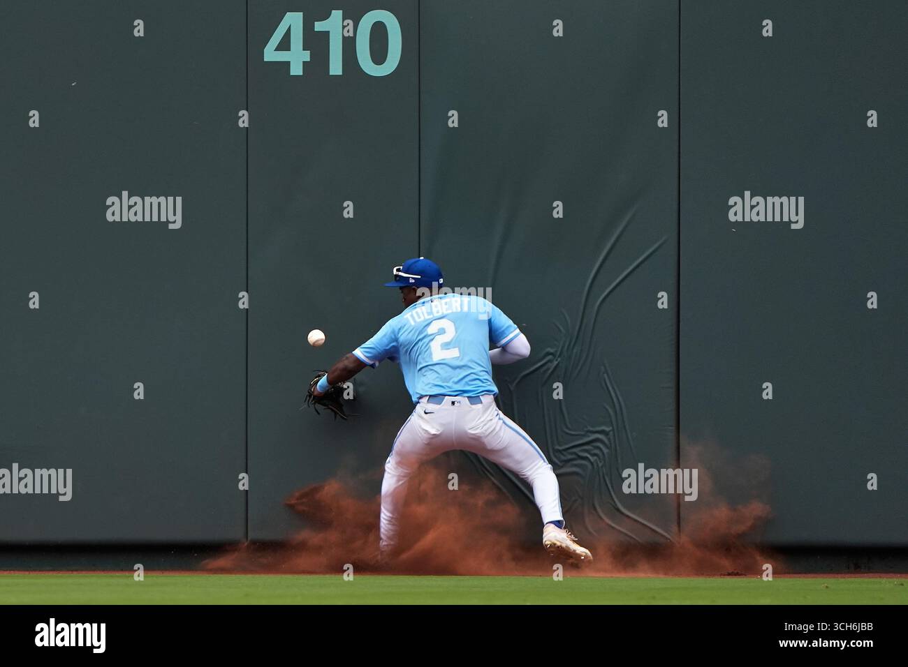 Kansas City Royals center fielder Tyler Tolbert chases a two-run triple ...