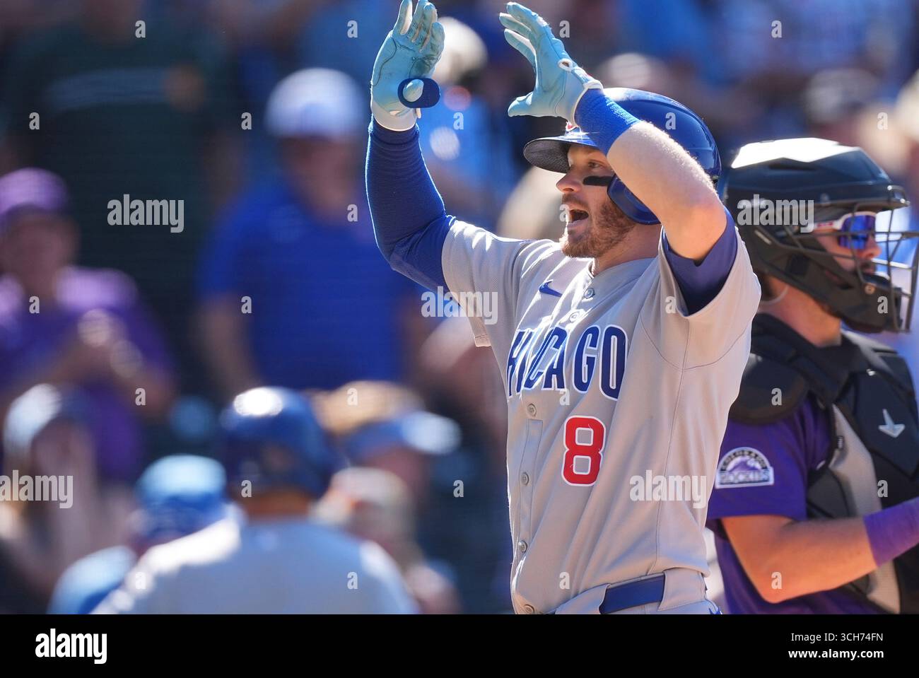 Chicago Cubs' Ian Happ celebrates as he crosses home plate after ...