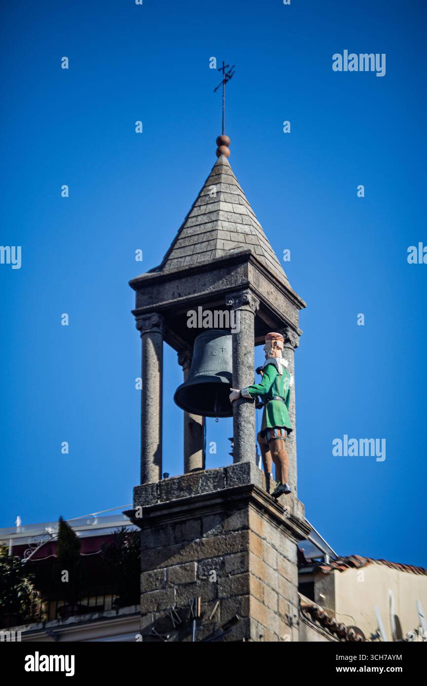 Abuelo Mayorga, the clock-striker automaton, raises his hammer atop the ...