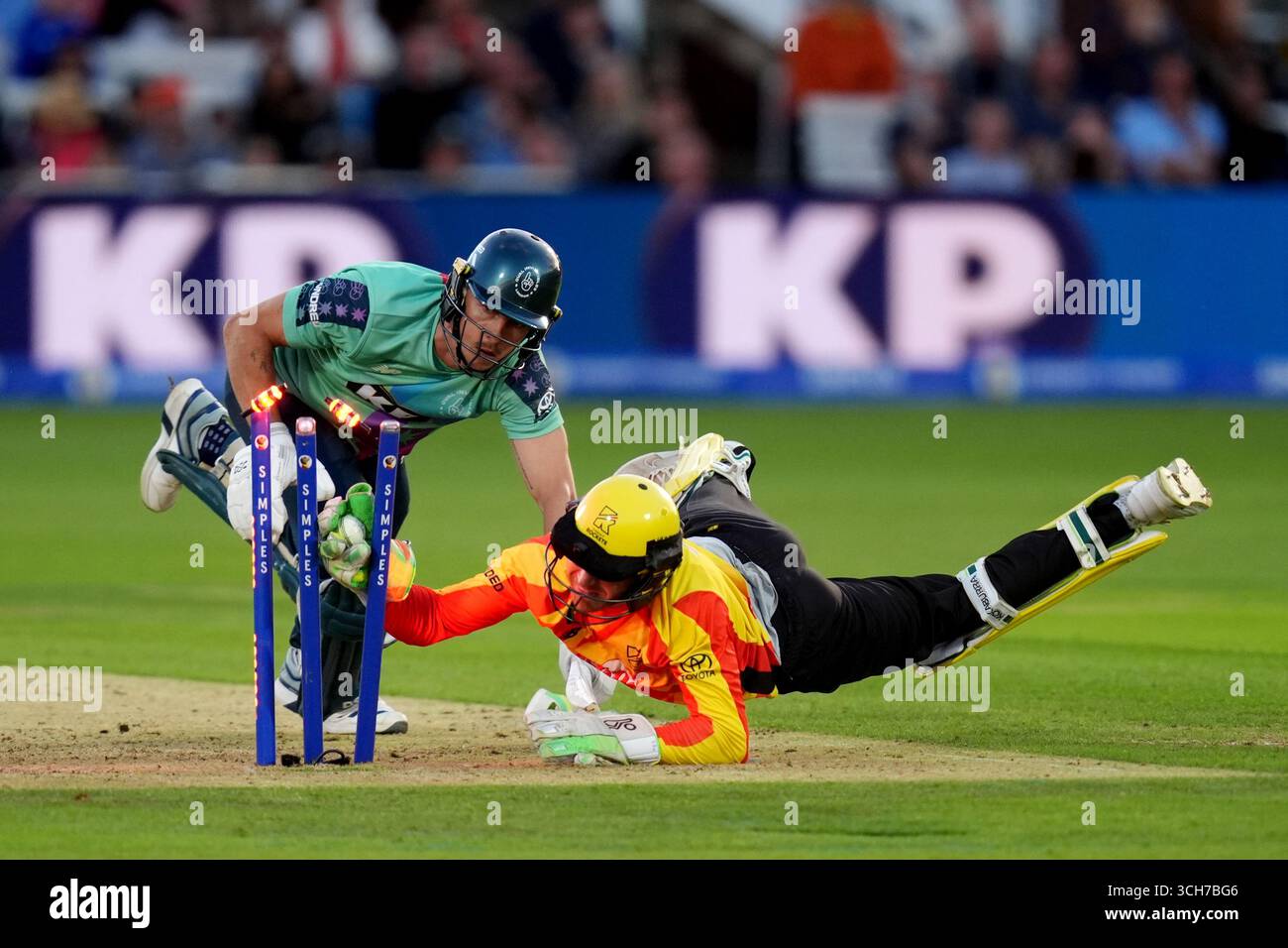 Trent Rockets' Ben Cox takes the wicket of Oval Invincibles' Tom Curran ...