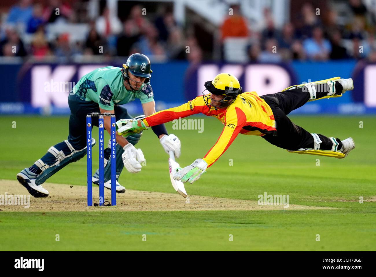 Trent Rockets' Ben Cox takes the wicket of Oval Invincibles' Tom Curran ...