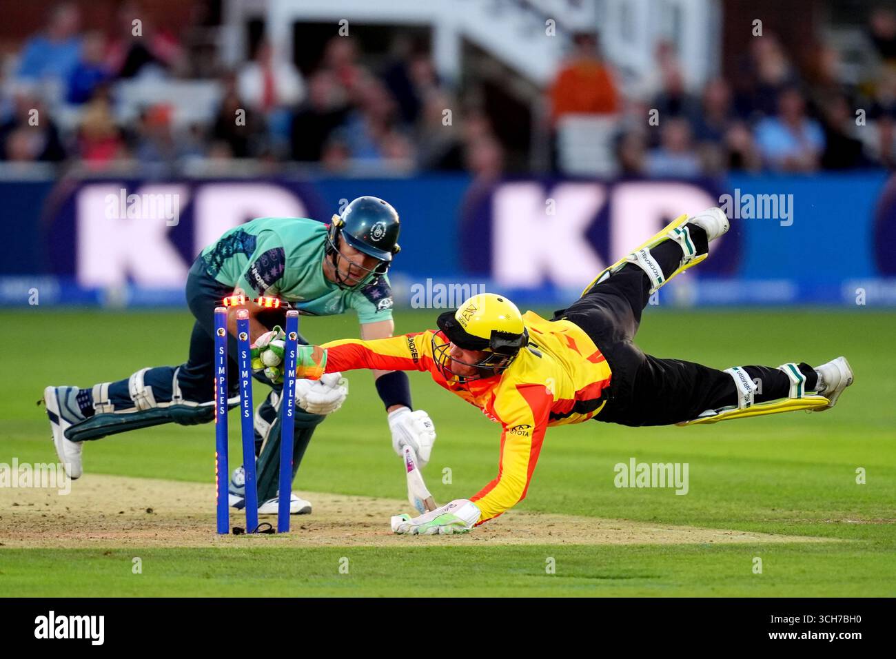 Trent Rockets' Ben Cox takes the wicket of Oval Invincibles' Tom Curran ...
