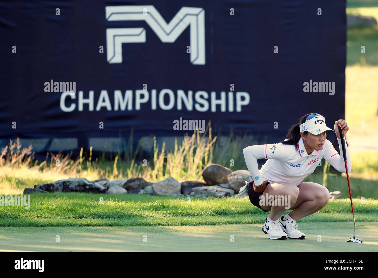 Jeeno Thitikul, of Thailand, lines up a putt on the 16th hole during the final round of the FM ...