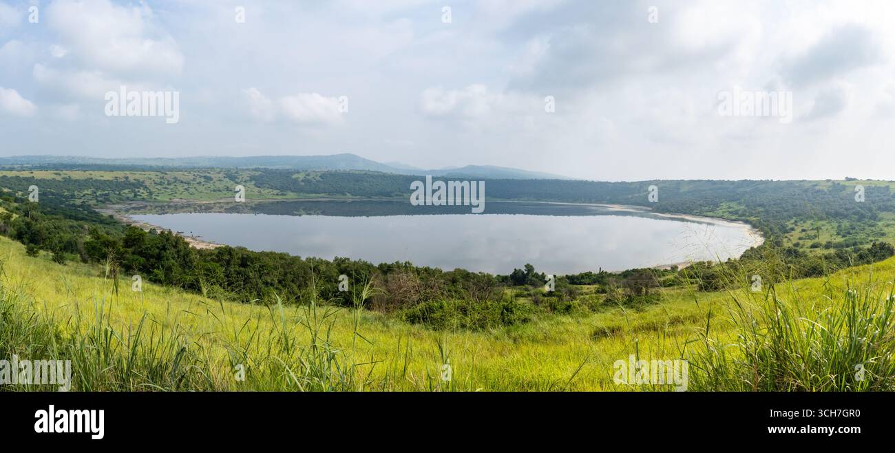 A crater lake in a caldera at the Queen Elizabeth National Park, Uganda ...