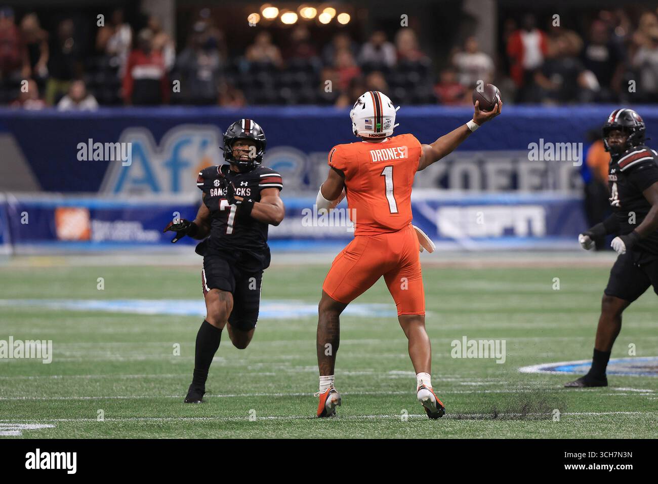 ATLANTA, GA - AUGUST 31: Starting quarterback Kyron Drones #1 of the Virginia Tech Hokies throws ...