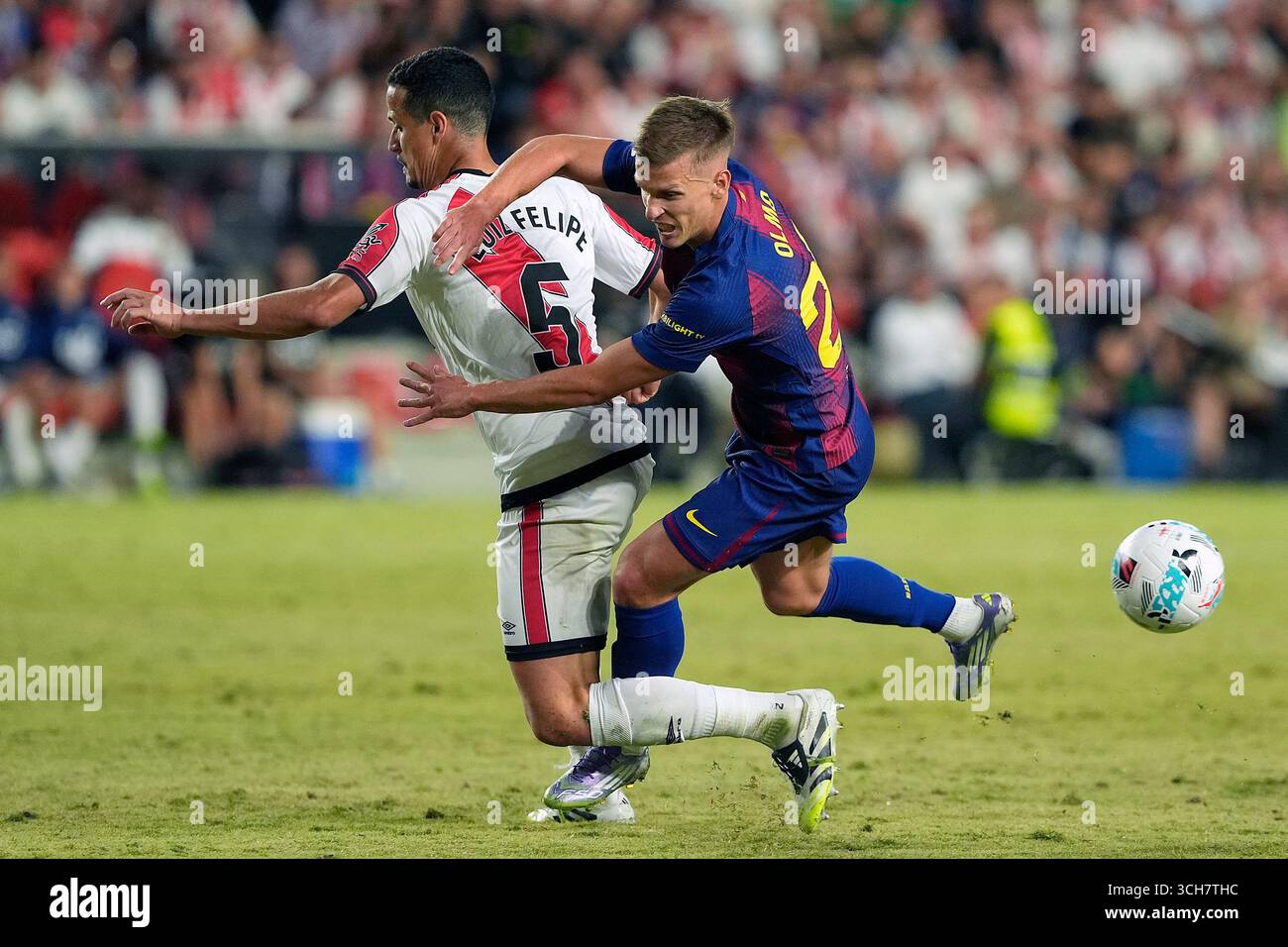 Rayo Vallecano's Luiz Felipe (l) and FC Barcelona's Dani Olmo during La Liga match. August 31 ...