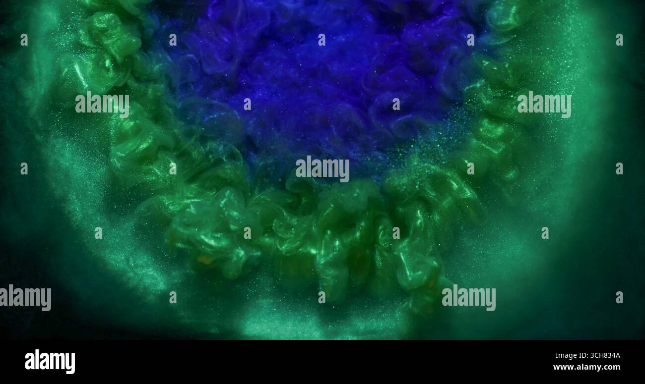 Shimmering dust paint explosion blue hi-res stock photography and ...