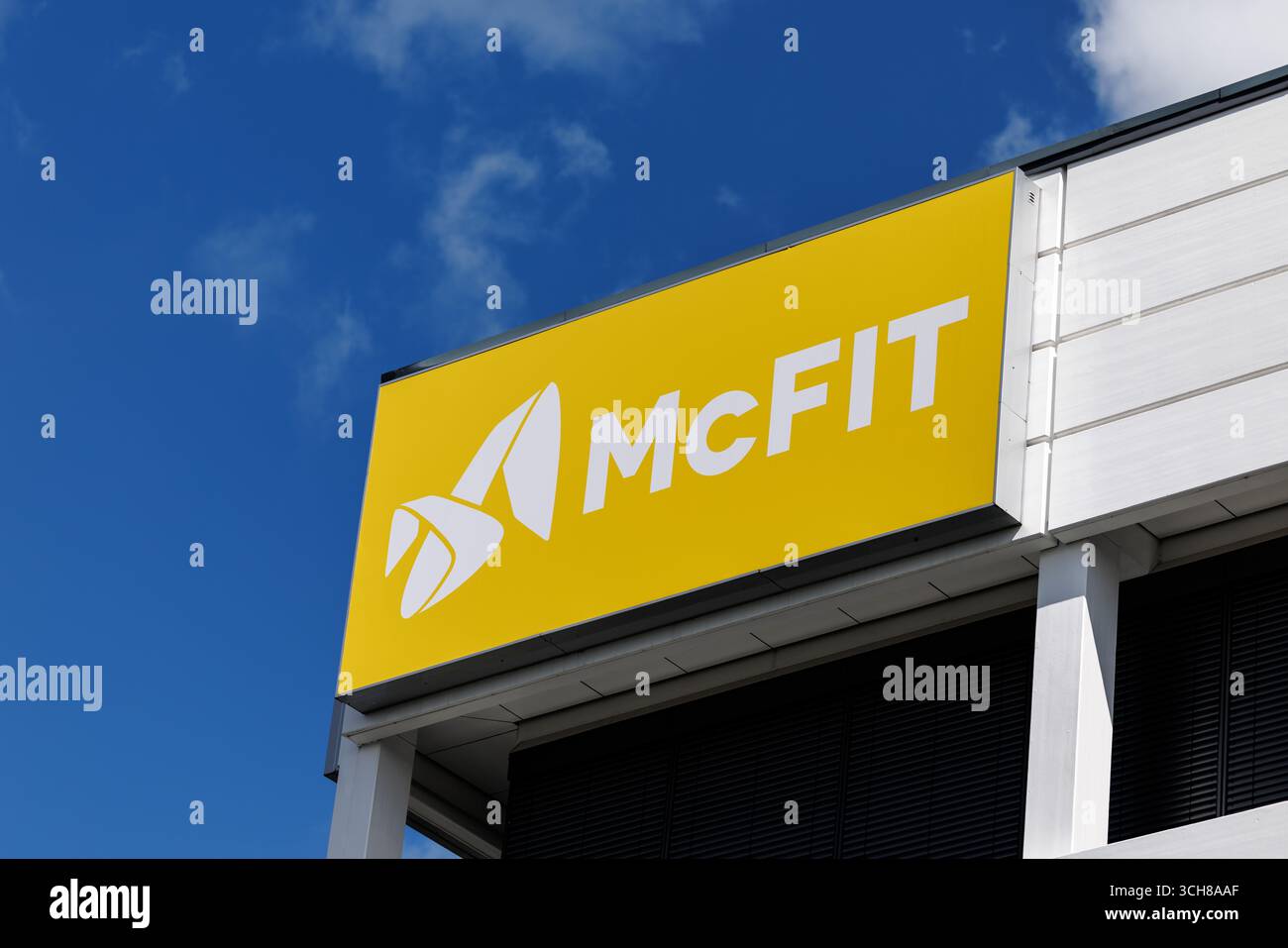 29 August 2025, Bavaria, Munich: The McFit brand logo and lettering can ...