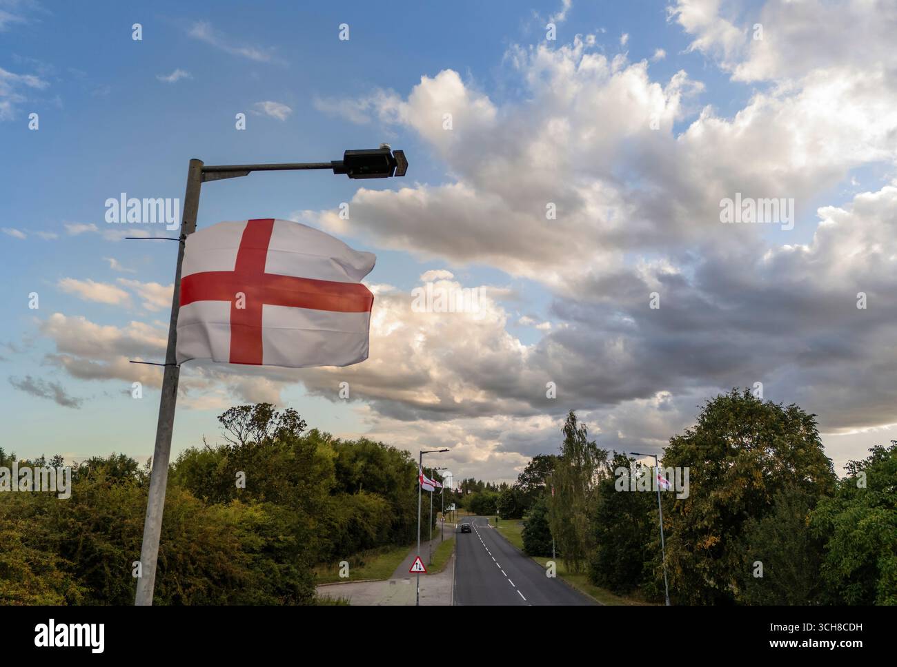 St George's Cross flags fly from lampposts in York, in Yorkshire ...