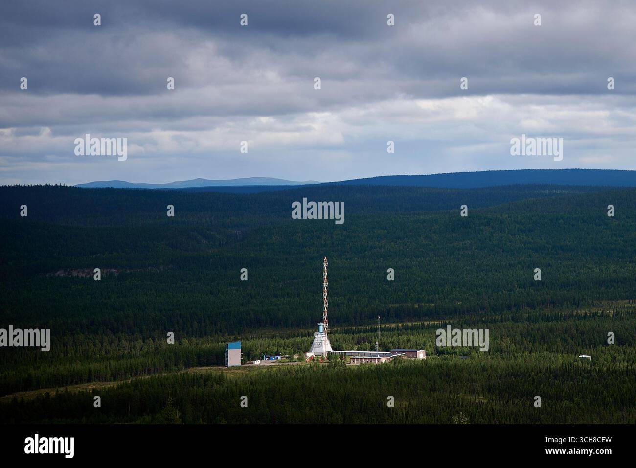Rays of sunlight filter through the clouds illuminating the Esrange ...
