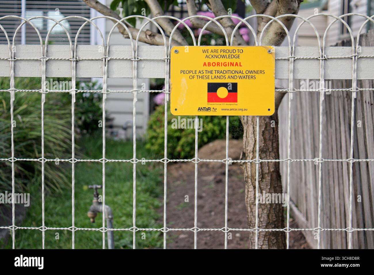 Aboriginal land acknowledgement sign on a suburban domestic house in a ...
