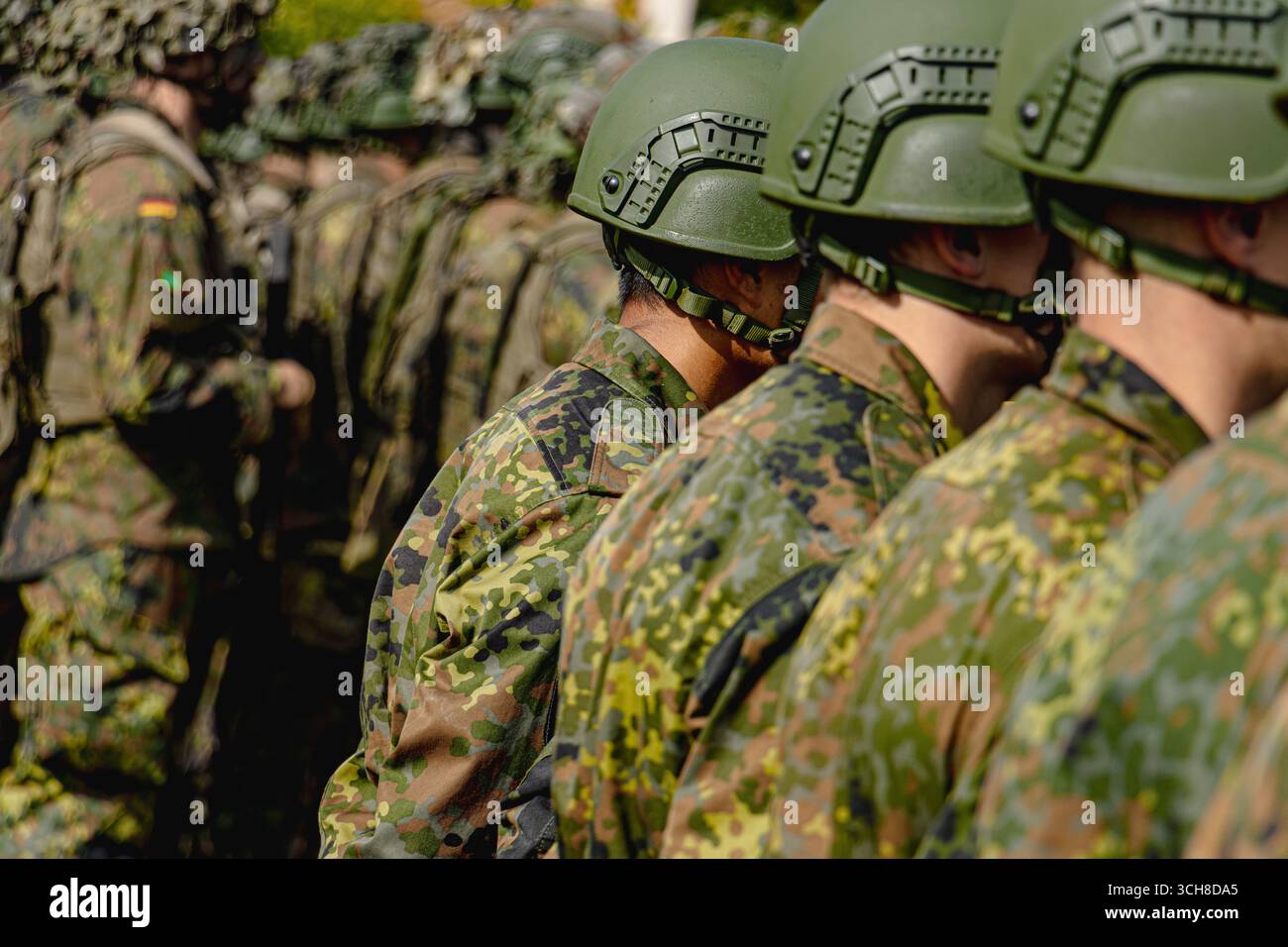 German Bundeswehr paratroopers stand in formation at a NATO event ...