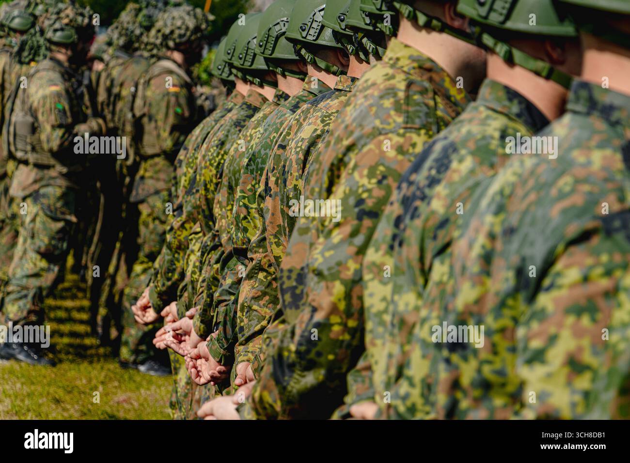 German Bundeswehr paratroopers stand in formation at a NATO event ...