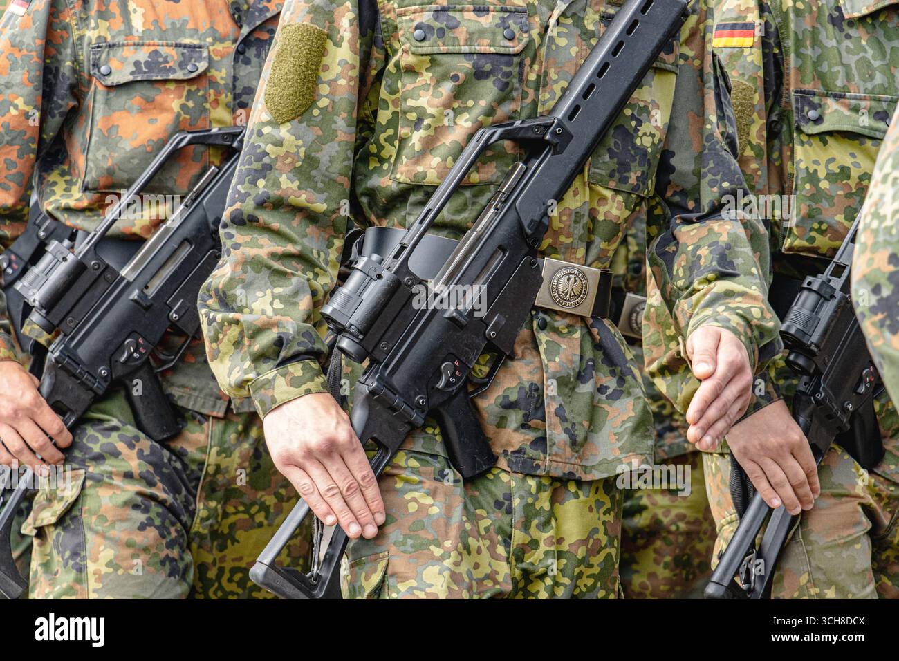 German Bundeswehr soldiers stand in formation wearing combat uniforms ...