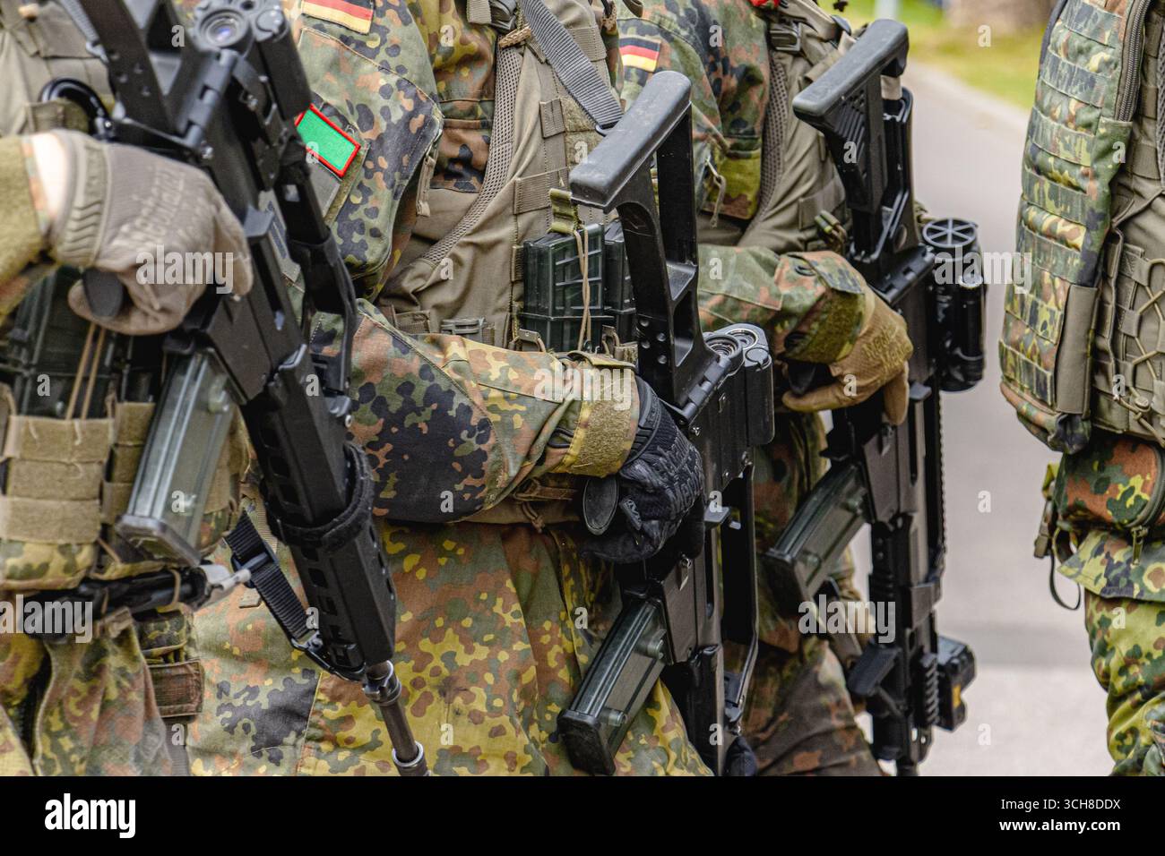 German Bundeswehr soldiers stand in formation wearing combat uniforms ...