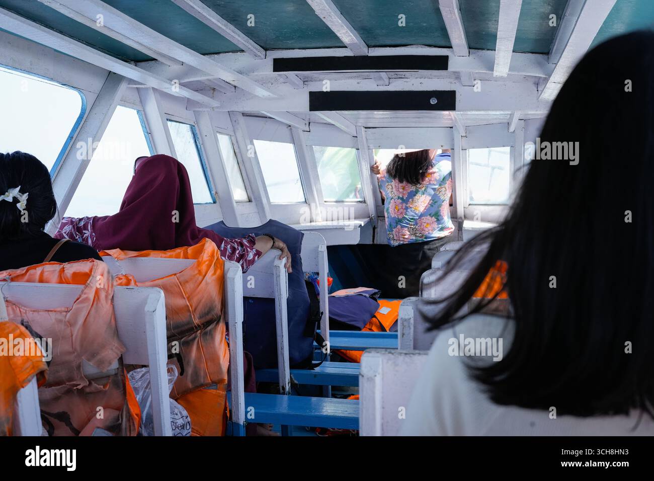 Passengers enjoying boat tour hi-res stock photography and images - Alamy