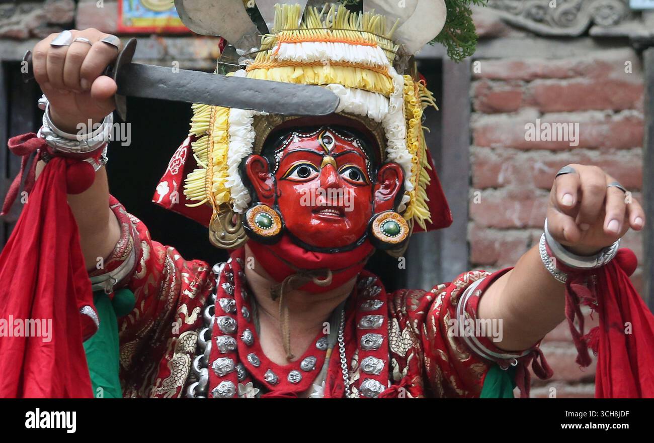 September 1, 2025, Kathmandu, Nepal: A masked dancer performs as part ...