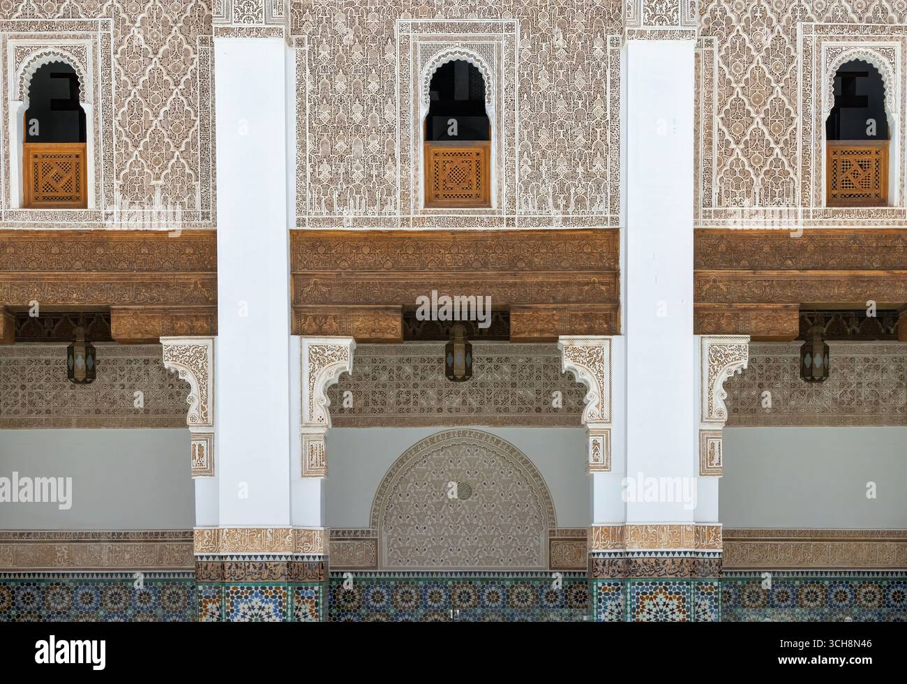 Carved stucco and cedarwood frieze with Arabic calligraphy and small ...