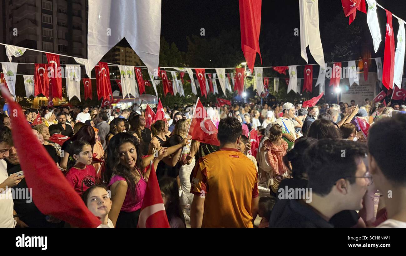 People in Tuerkiye celebrate Victory Day, commemorating the decisive ...