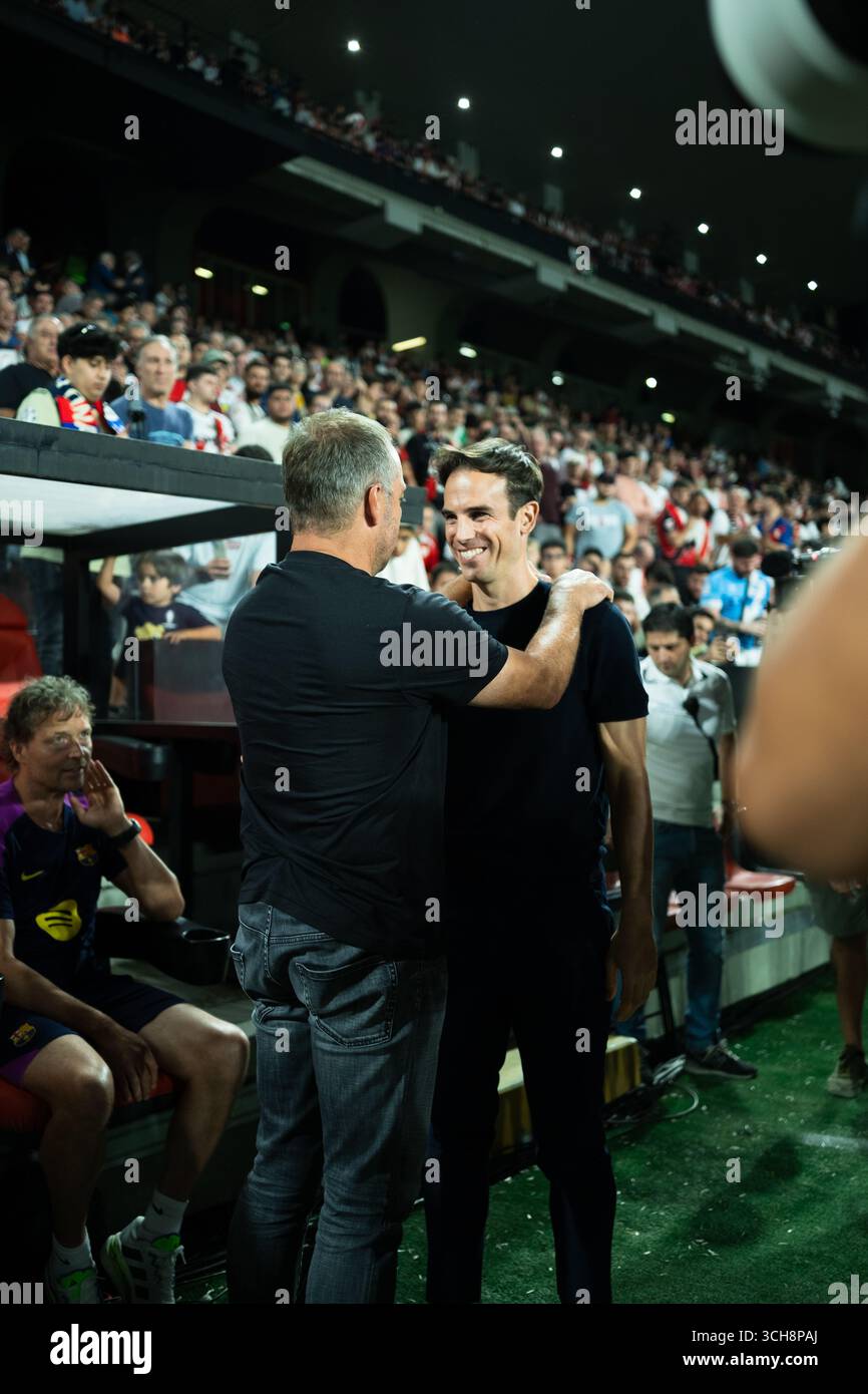 Madrid, Spain. 31th Sep 2025. Hansi Flick and Íñigo Pérez during Rayo Vallecano and FC Barcelona ...