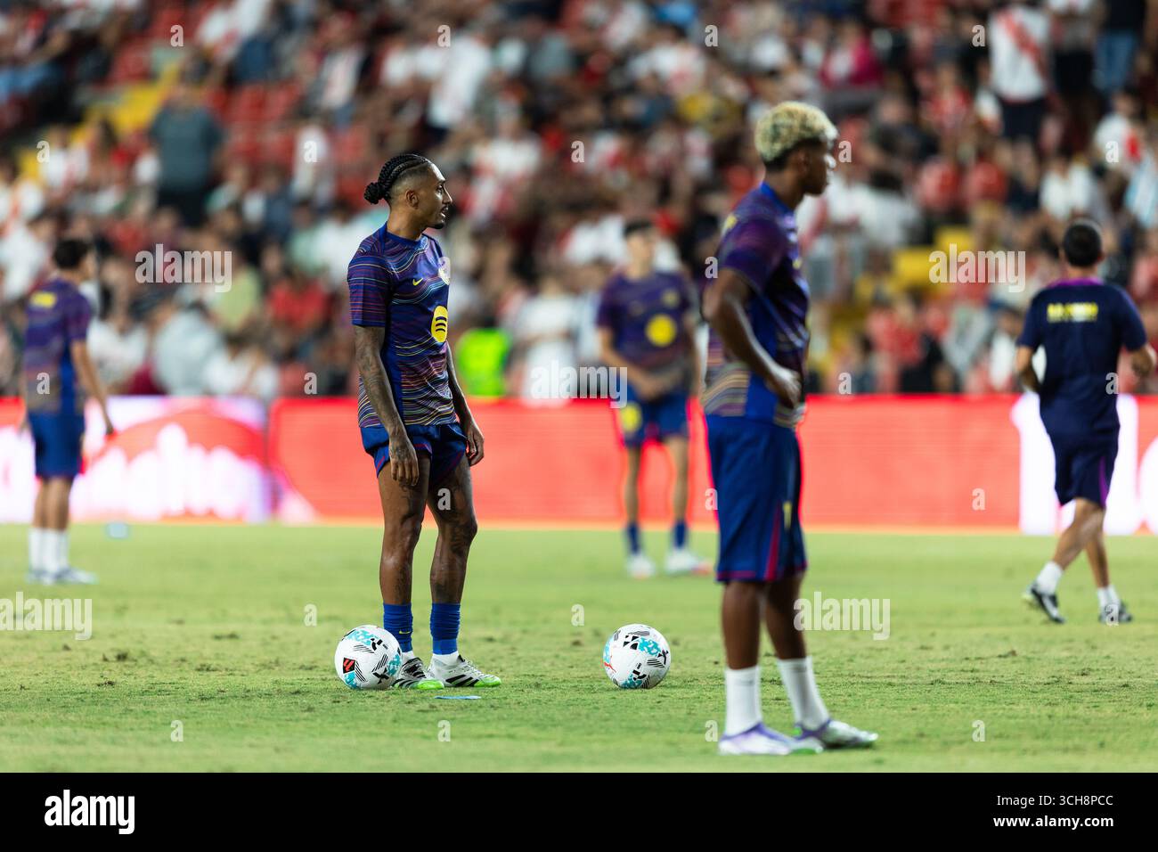 Madrid, Spain. 31st Aug 2025. Raphinha and lamine yamal during Rayo ...