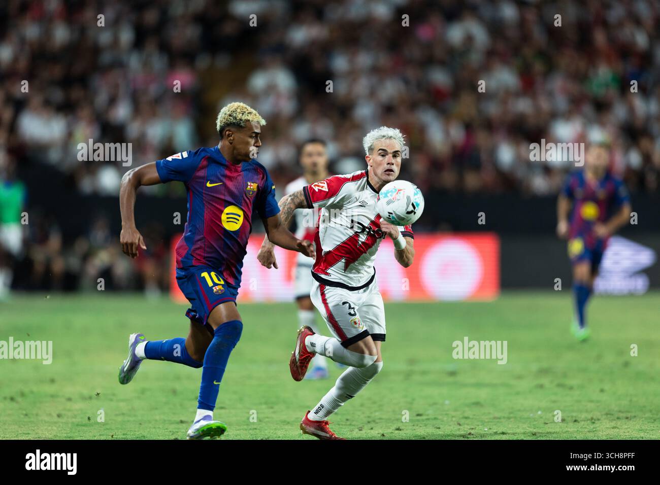 Madrid, Spain. 31st Aug 2025. Lamine Yamal and Pep Chavarría during ...